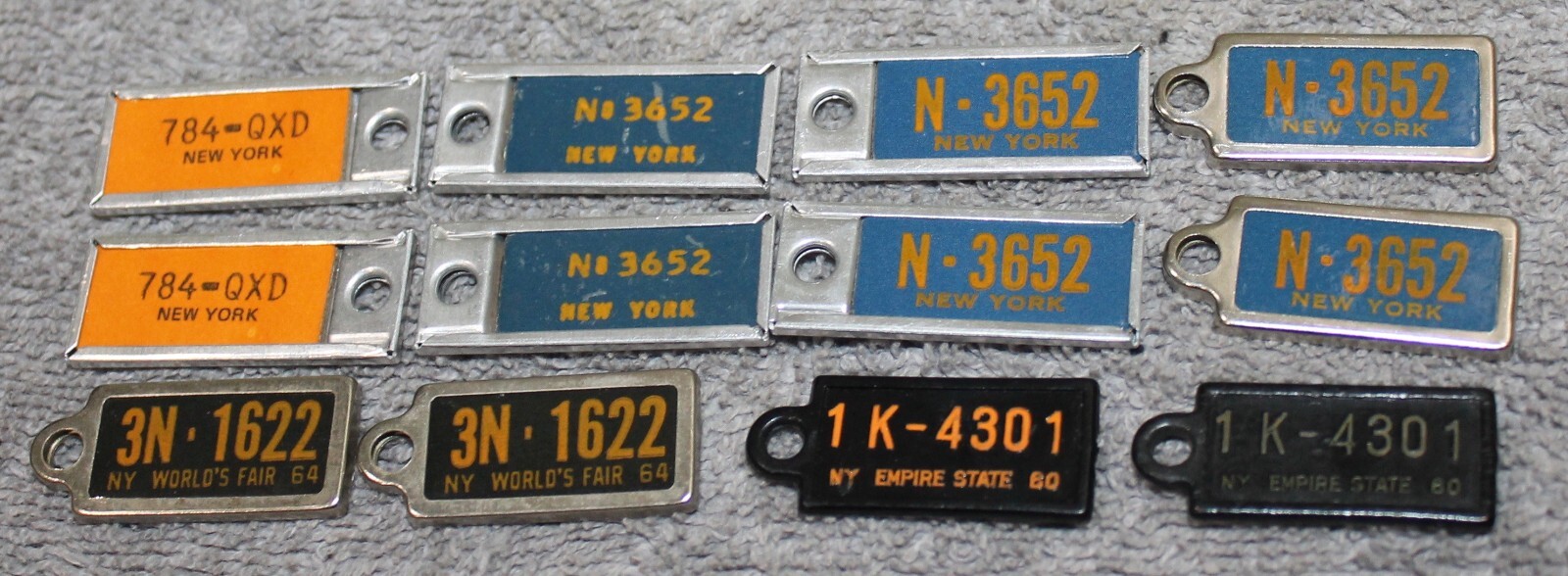 VINTAGE LOT OF 12 LICENSE PLATE KEY CHAINS TAGS DISABLED VETERANS NEW ...
