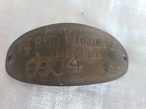 VINTAGE "THE RATH PACKING CO."WATERLOO, IOWA;BRASS TAG #9904; 2.75" X 1 ...