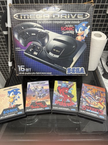 Sega Mega Drive 16-Bit Black Game Console with 2 Controllers and 4 ...