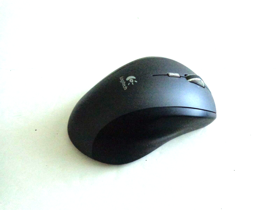 Logitech MX Revolution Cordless Laser Mouse With charger and USB dongle ...