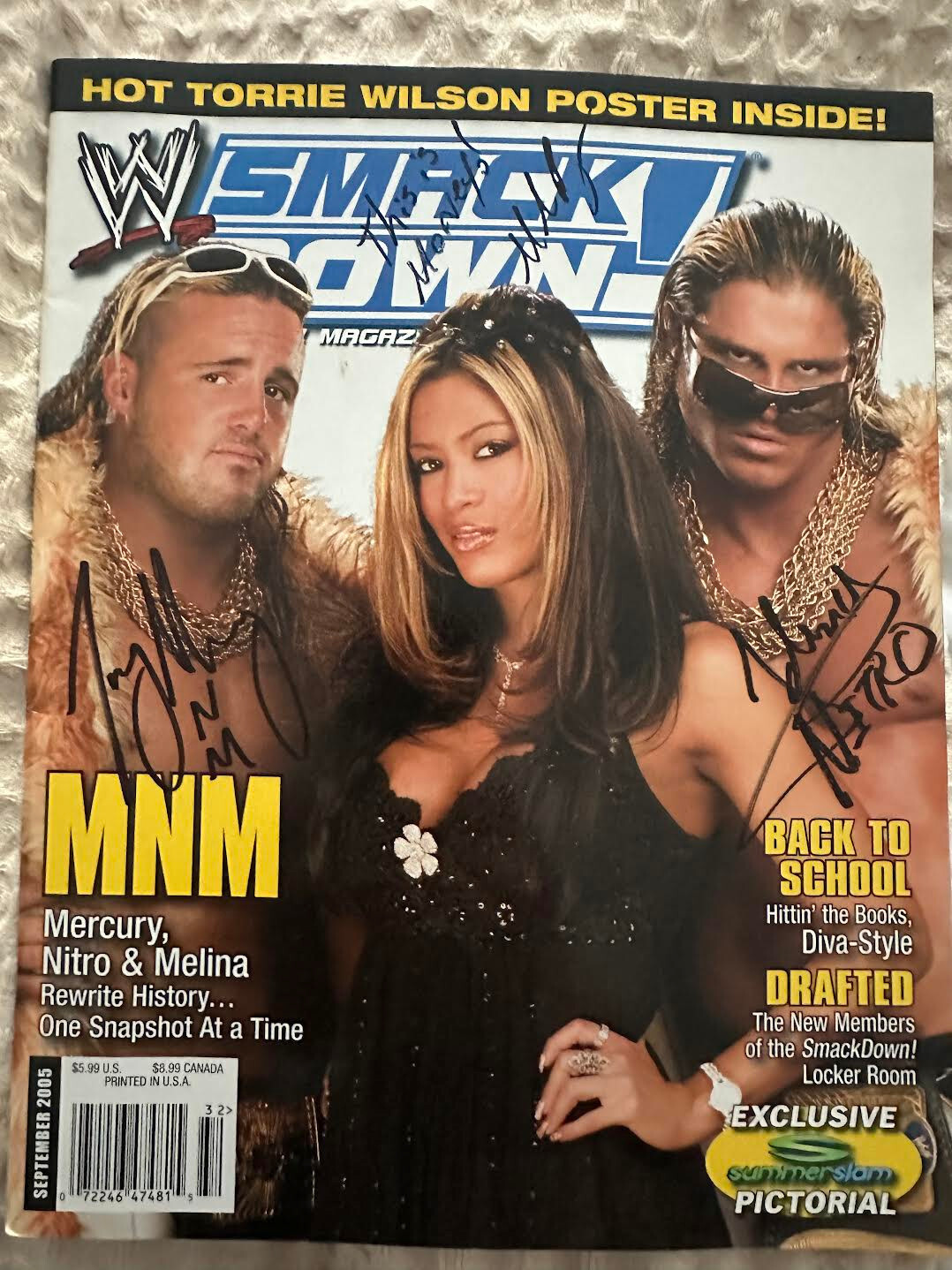 September 2005 WWE Smackdown Magazien signed by Meliba, Mercruy and ...