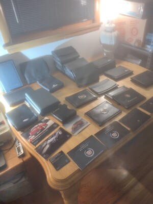 Vehicle Owners manual cases Ram Audi Cadillac Ford Jaguar Land Rover ...