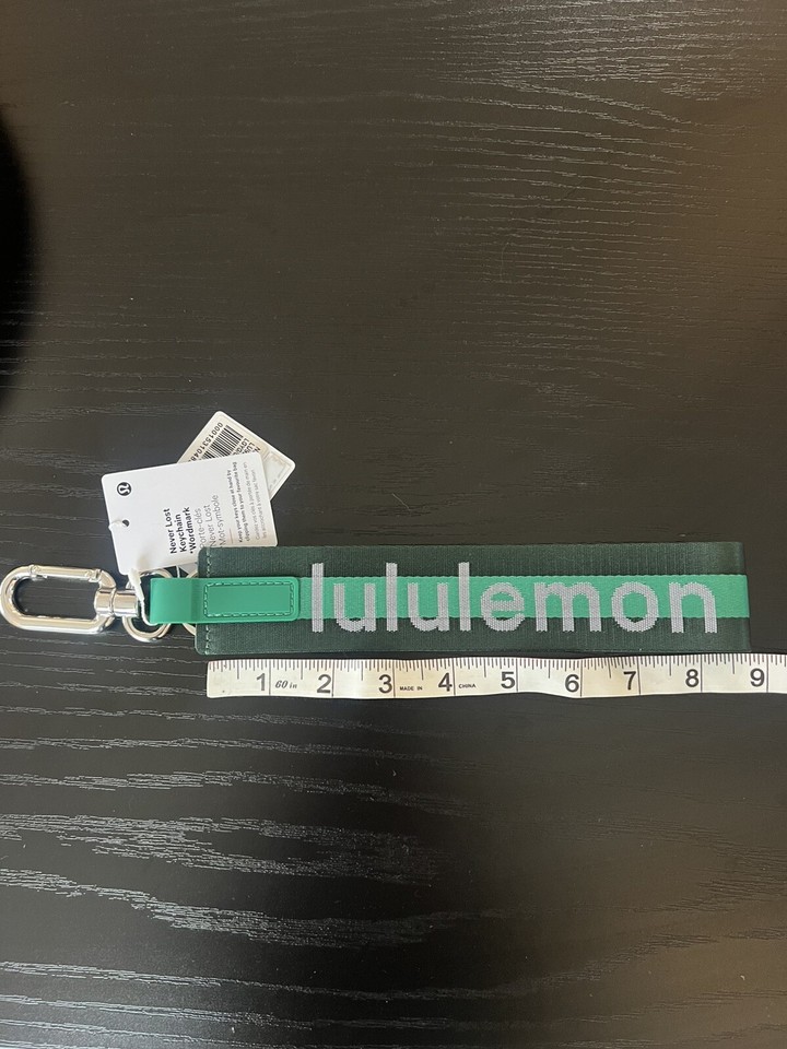 Lululemon Never lost keychain Legacy Green Cascadia White One Size logo ...