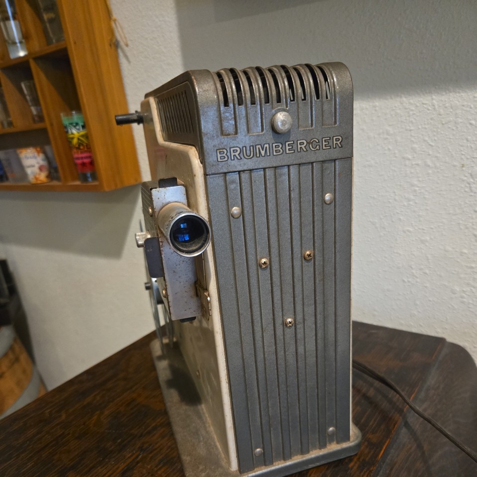 VINTAGE ANTIQUE MOVIE FILM PROJECTOR- Brumberger 1503 | eBay