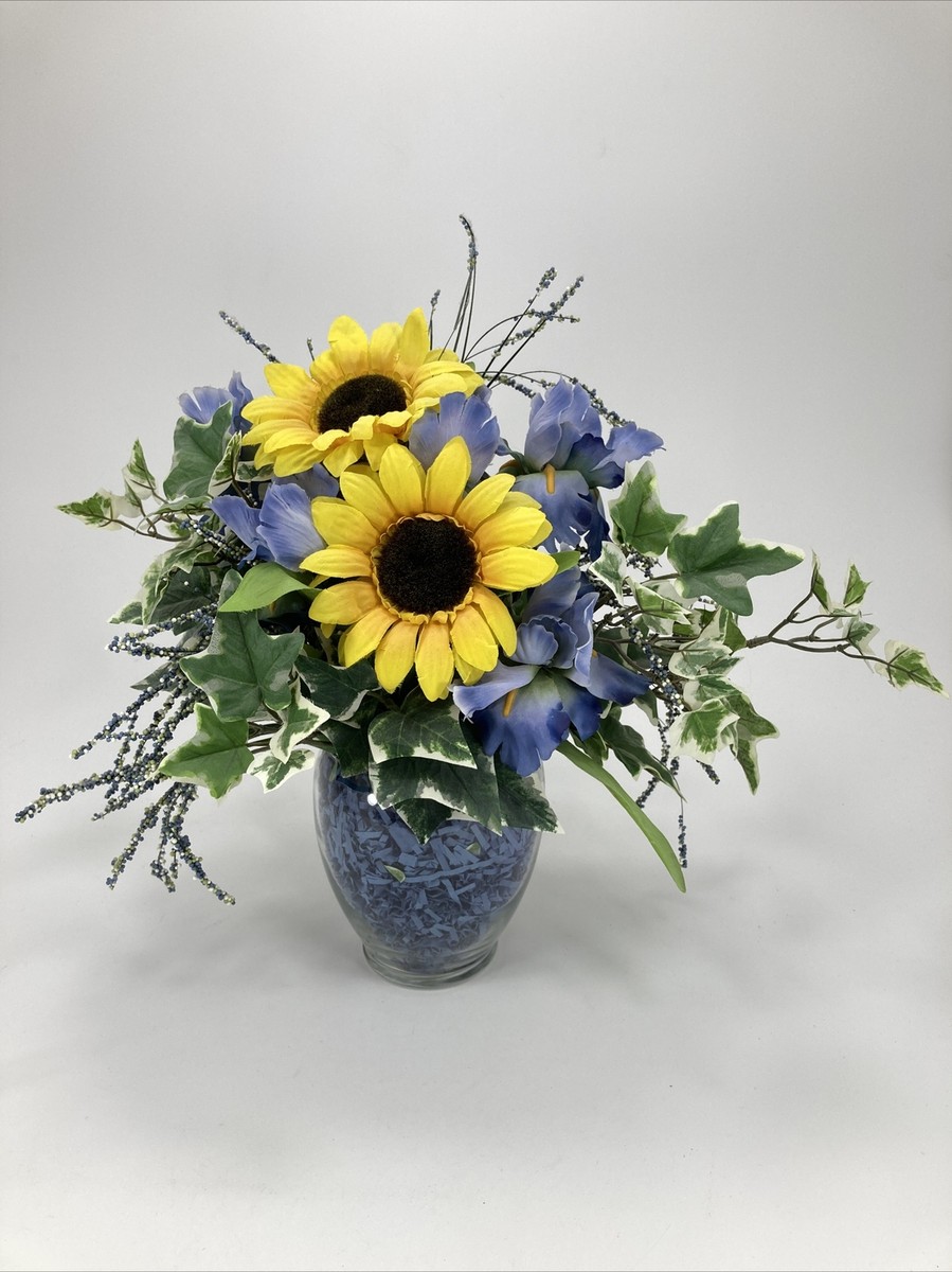Blue Vase And Sunflower Centerpiece