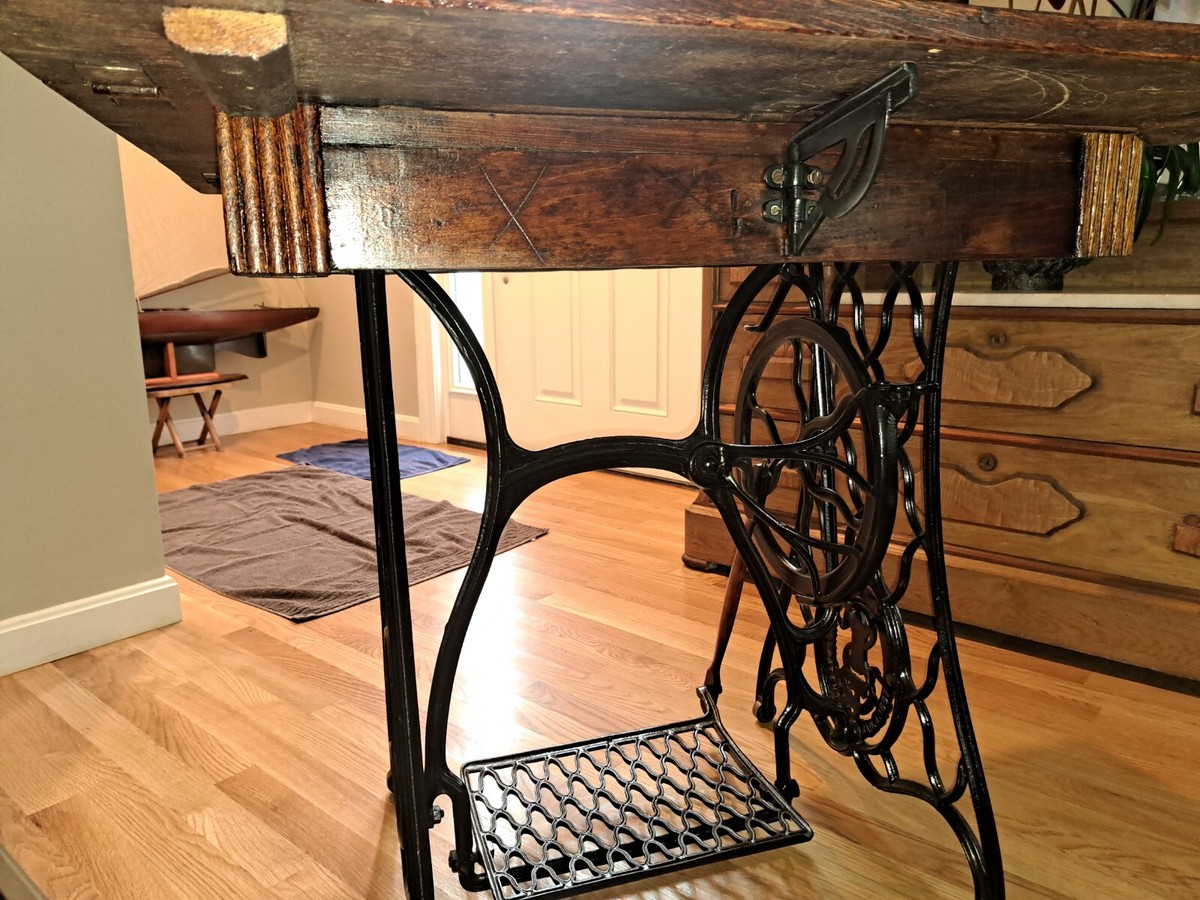 Upcycled Community Table Fabricated From An Antique Castiron Sewing