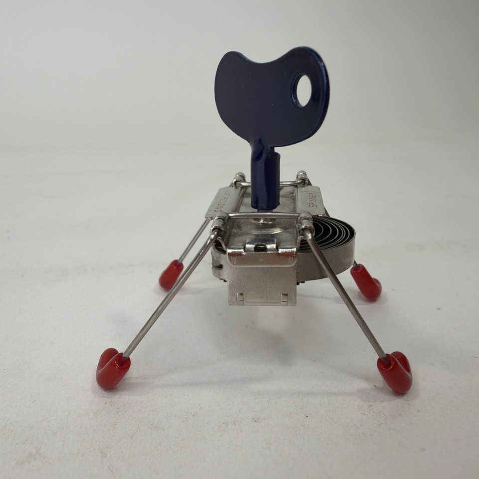 Kikkerland Spinney Wind-Up Toy by Chico Bicalho Metal Legs & Red Feet ...