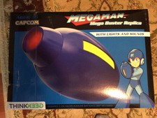 / Factory Capcom Mega Man Buster Gun Replica - ThinkGeek for sale ...