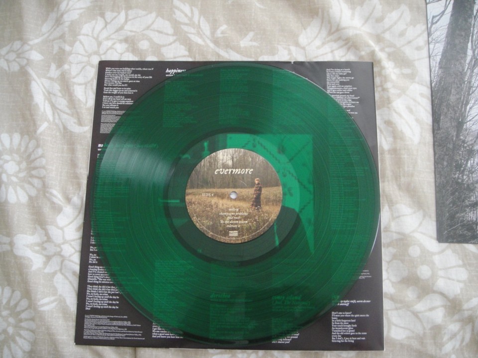 Taylor Swift vinyl LP "Evermore" (green colored vinyl)......EXCELLENT ...