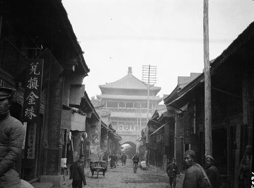 Sian China, street scene in district with view towards city gate OLD ...