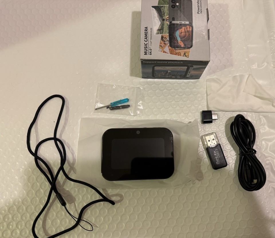 4K digital camera 64 MP , with 3-in OLED full-color touch screen and 3 ...