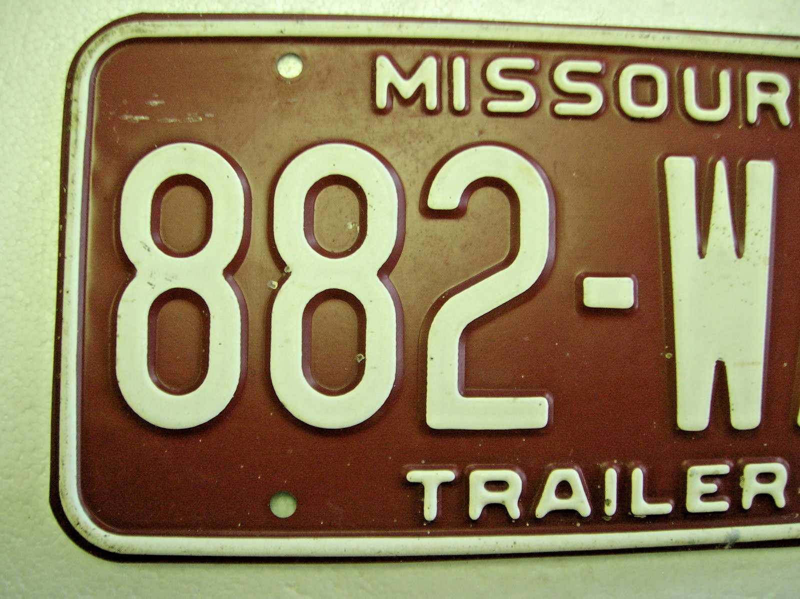 1-1995 Missouri trailer license plate in good cnd.Bowed.Minor wear ...