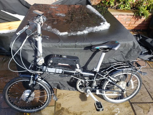 Can anyone suggest hub conversion kit options for a Dahon Helios P8 with 74mm front axle and ...