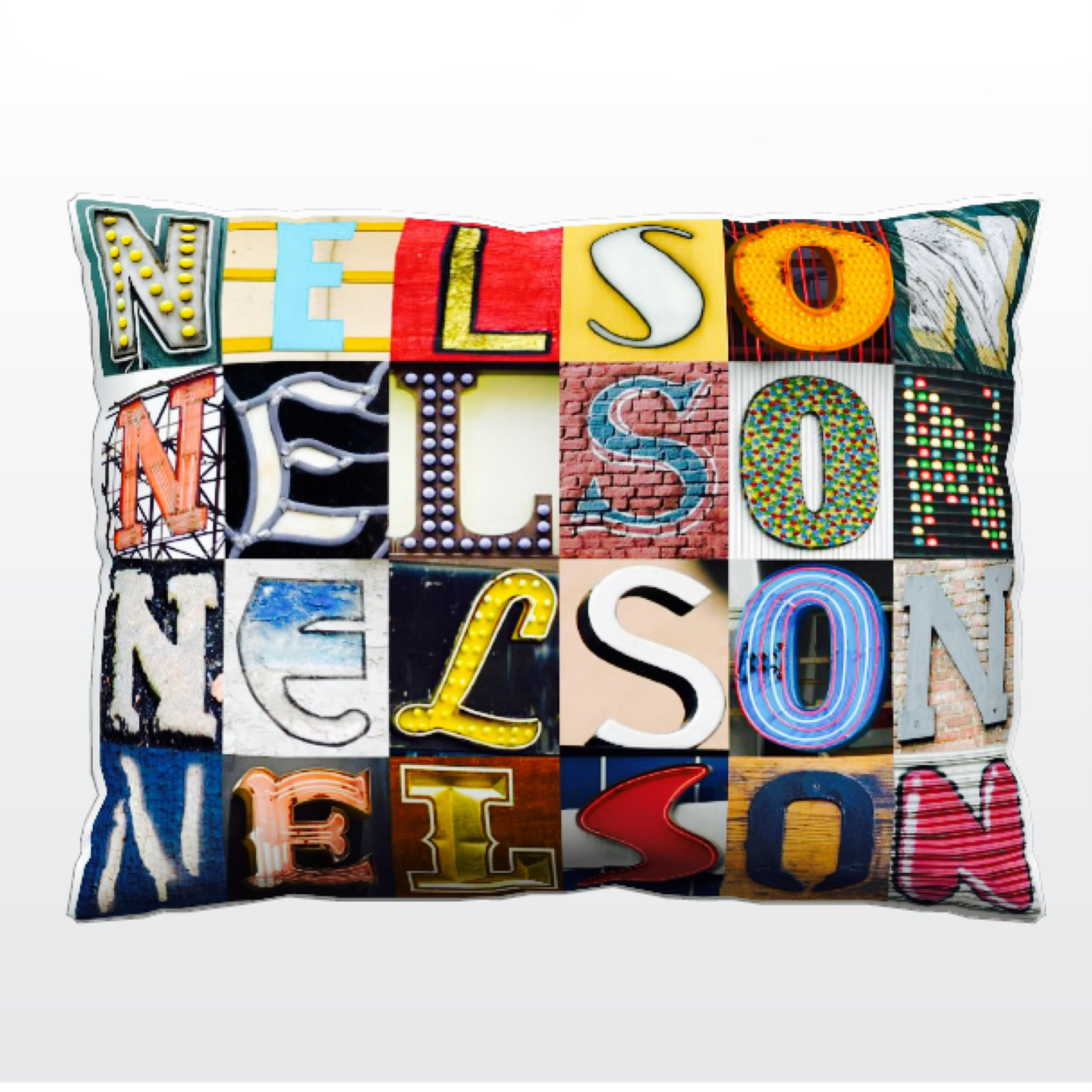 Personalized Pillow featuring the name NELSON in photos of sign letters ...