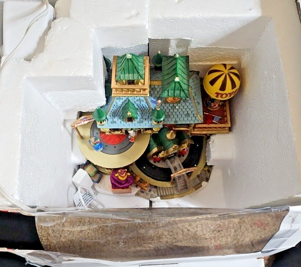 Lemax toy World store house village animated Building Toy World ...