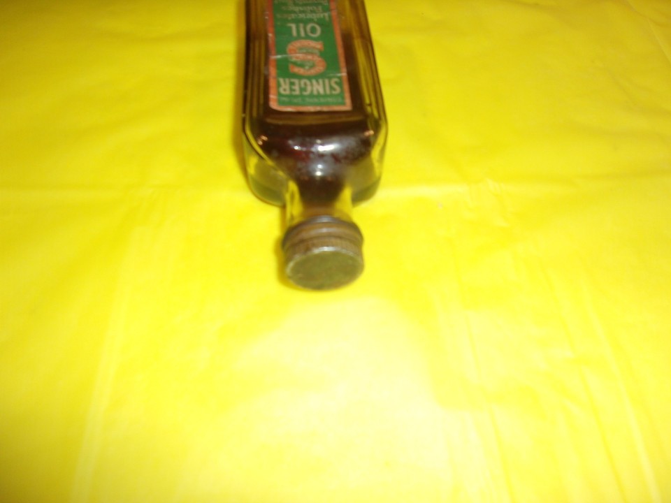 VINTAGE ORIGINAL SINGER OIL 3oz. EMBOSSED GLASS BOTTLE WITH PAPER LABEL ...