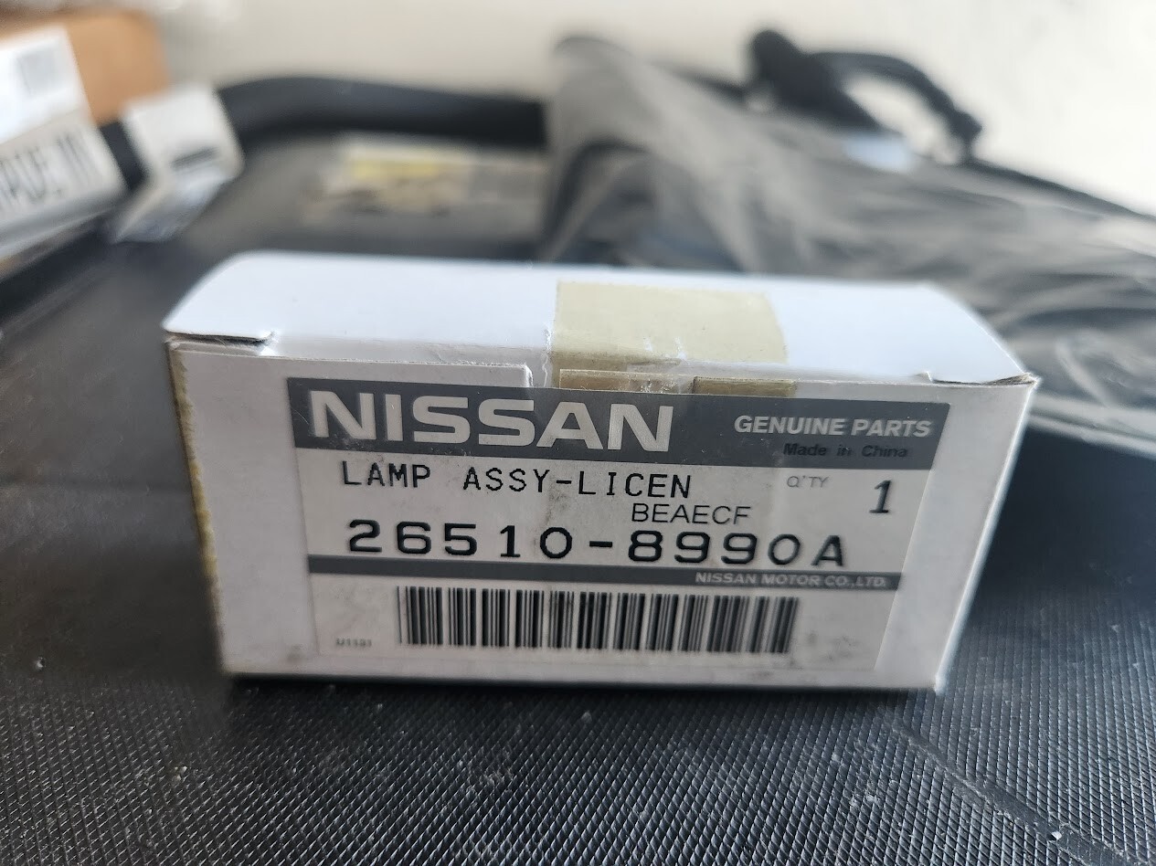 NEW OEM REAR RH or LH SIDE LICENSE PLATE LAMP 26510-8990A (lot of 2) | eBay