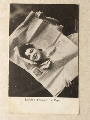 B1474 Postcard Lady looking through the newspaper | eBay