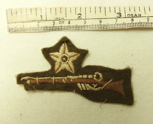 An Original Military CCF 1st Class Marksman Rifle & Star Cloth Badge ...