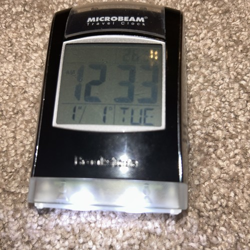 MicroBeam Travel Clock with Calendar/flashlight/Temp. Brookstone ...