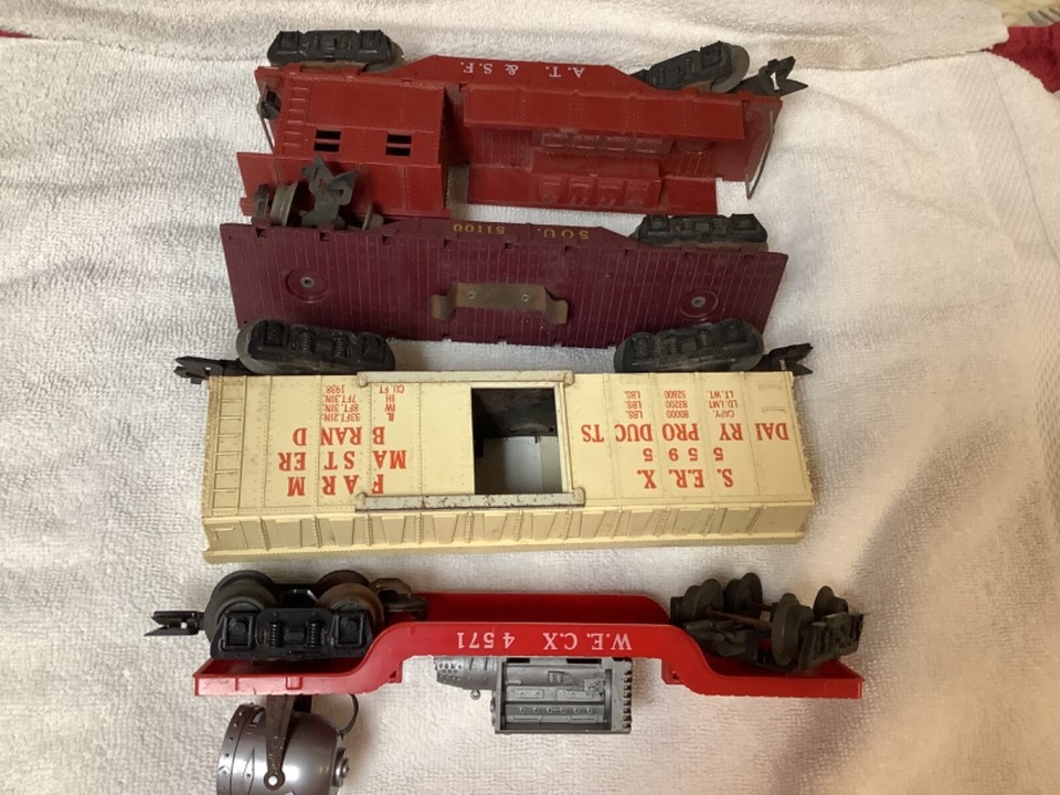 Marx W.E.C.X. 4571 spotlight car,caboose,cattle car, flatbed/4 cars as ...