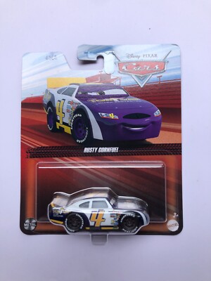 DISNEY PIXAR CARS - PISTON CUP RACER *RUSTY CORNFUEL* #121 Tow Cap NEW ...
