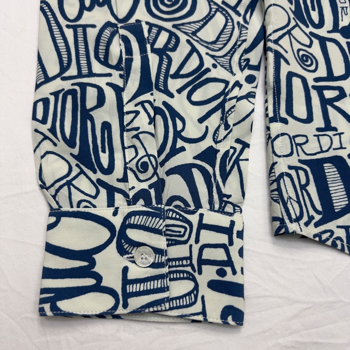 Dior x Shawn Stussy White & Blue Swirl Logo Printed Shirt Dior x Shawn Stussy White & Blue Swirl Logo Printed Shirt