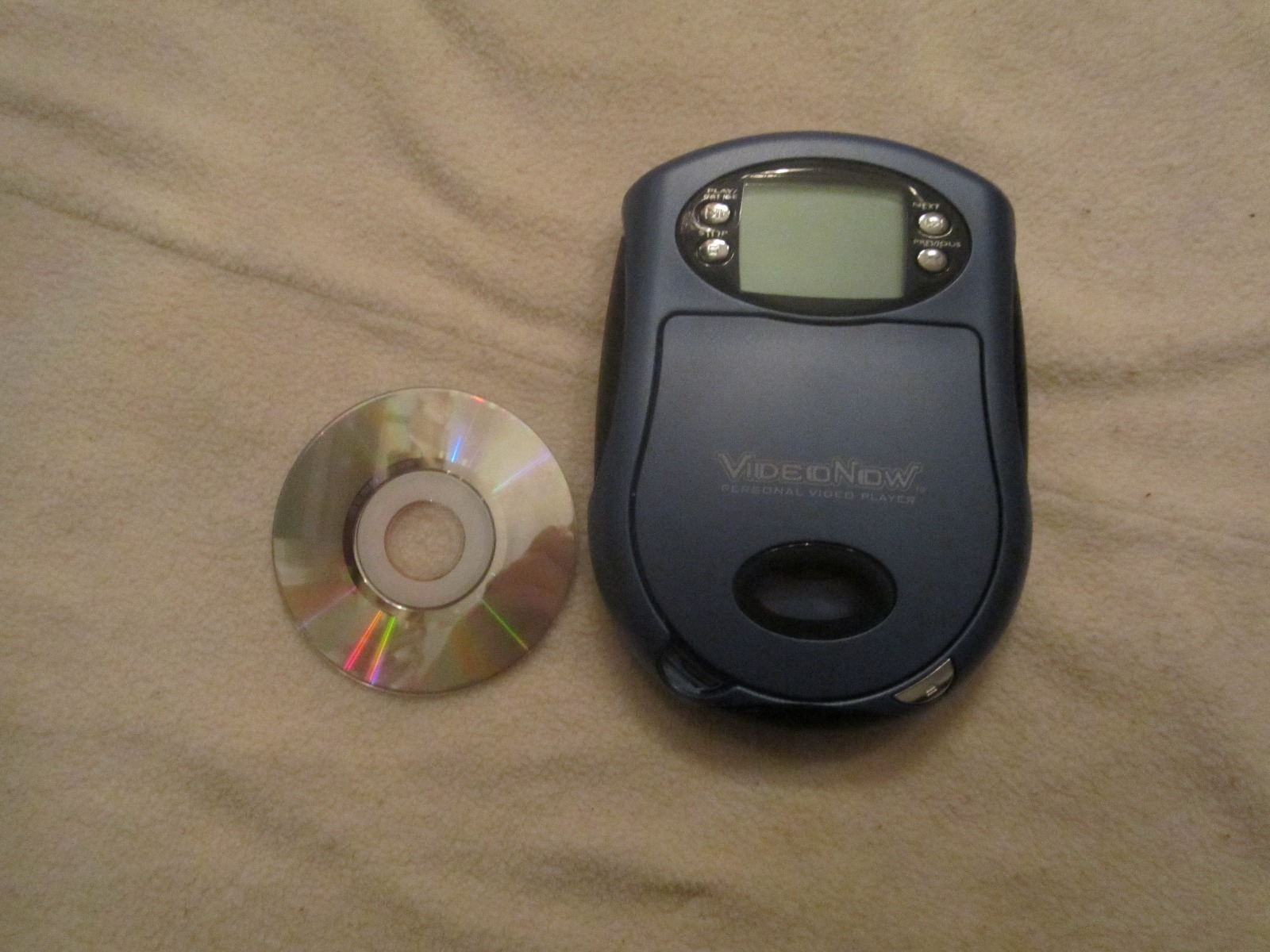 A Blue VideoNow Personal Video Player and a disc | eBay