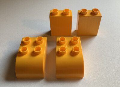 lot of 4 assorted gold-yellow Duplo blocks - 1X2 tall, 2X3 sloped front ...