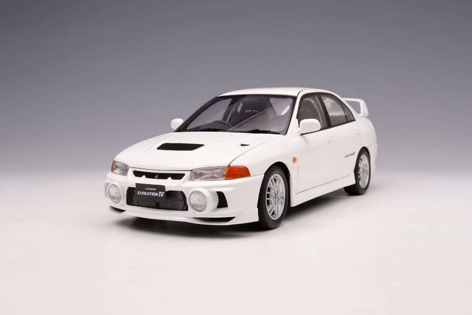 MOTORHELIX 1/18 MITSUBISHI LANCER EVO IV WITH ORIGINAL LICENSE (PRESALE ...