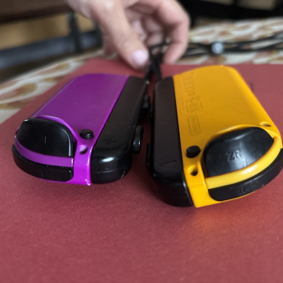 Nintendo Switch Joy-Con Controller Pair Neon Purple/Neon Orange Faulty ...