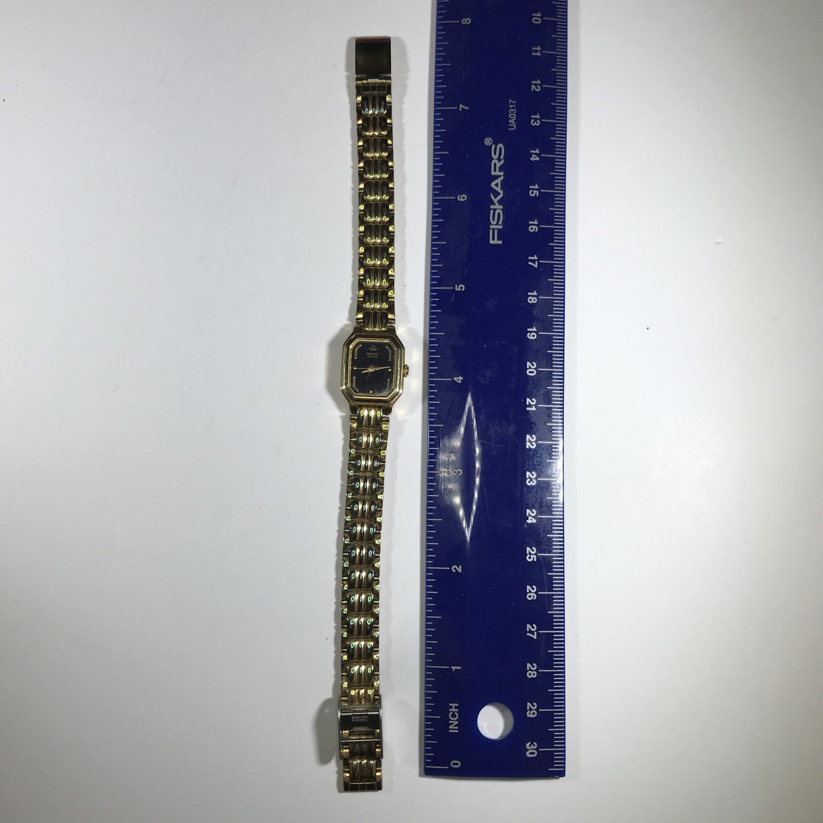 Seiko Women's Gold Tone Black Dial Rectangle Case 17mm Watch V401-5250 ...