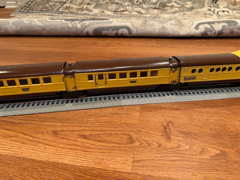 Rare pre-war Lionel train with track and transformer. Yellow and brown ...