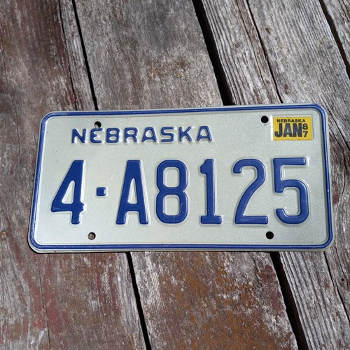 1987 Nebraska License Plate - "4 - A8125" (navy on offwhite) JAN 87 ...