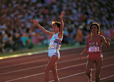 British athlete Wendy Sly exulting near American colleague Cin- 1984 ...
