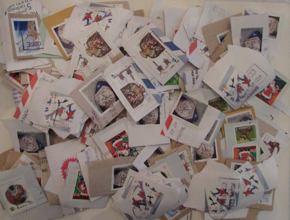 5 pounds of Worldwide stamps Box lot hoard on paper box filled to the ...