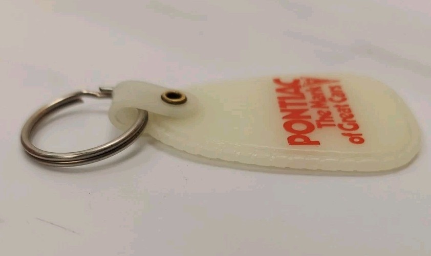(2) Vintage GM Pontiac Logo Glow In Dark Dealership Key Chain Mark Of ...