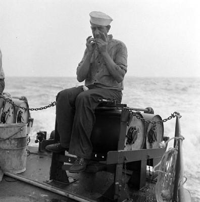 WW2 Photo WWII US Navy Sailor Rolling Smoke on Depth Charge Rack 1941 / ...
