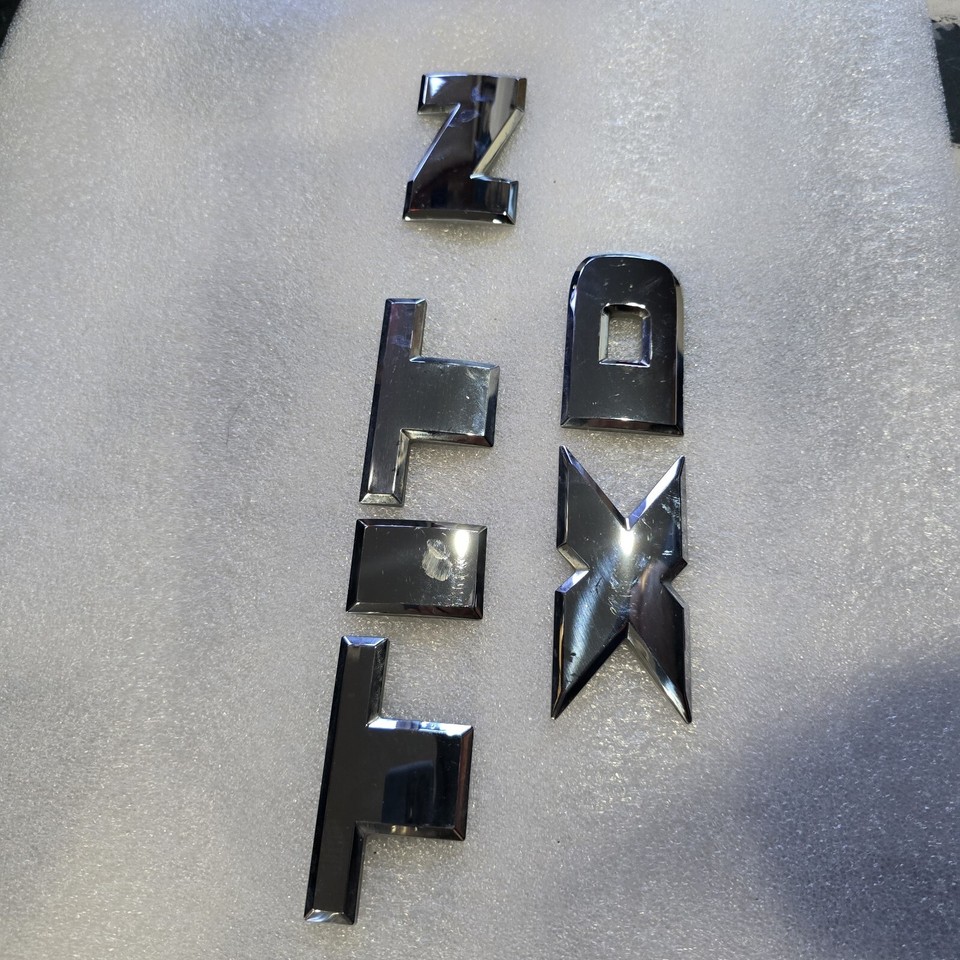 2018-2023 Nissan Titan Front Door Emblem Nameplate (MISSING "A") 80892 ...