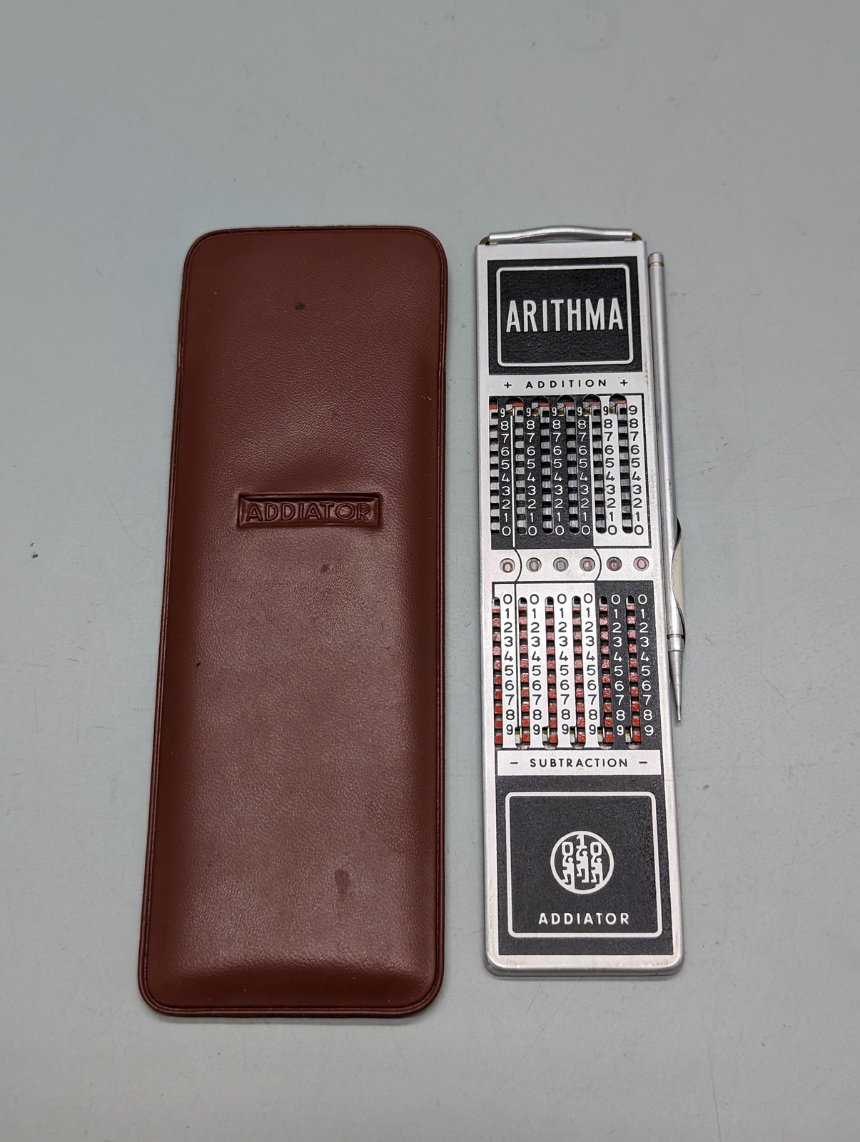 Addiator Arithma* mechanical pocket calculator, Addiator Gesellschaft ...