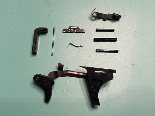 USED GLOCK 19 GEN 3 LOWER PARTS TRIGGER EJECTOR SLIDE LOCK MAG CATCH ...