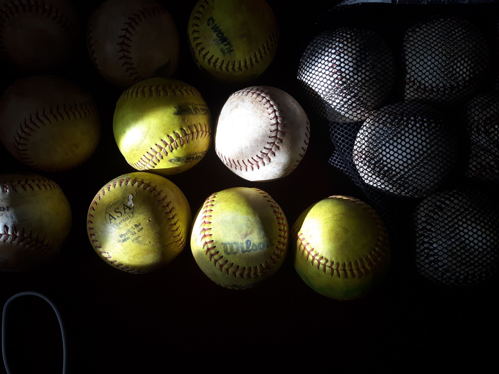 Used softballs all 12 inch ...20 total 375/44 and 52/300 softballs& 47 ...