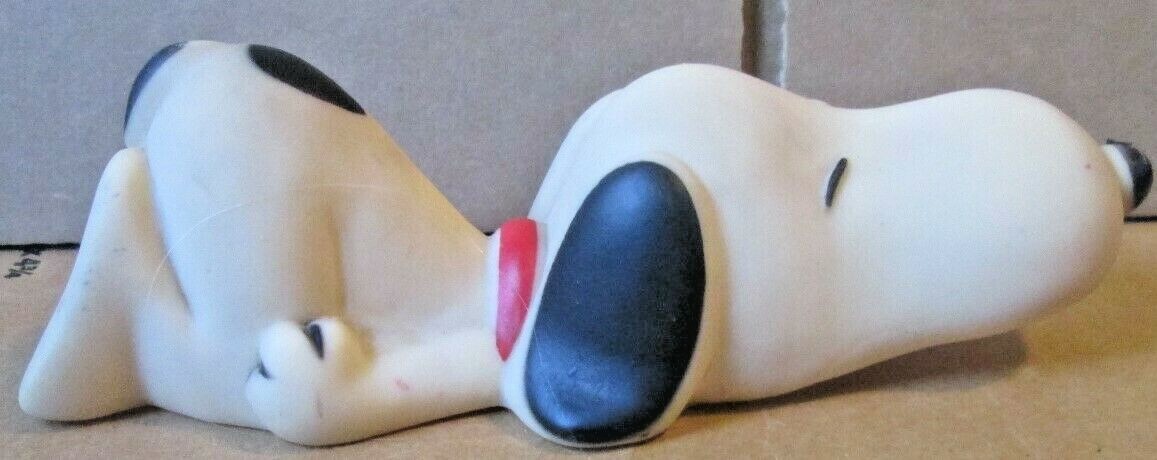 Snoopy Laying In Bed