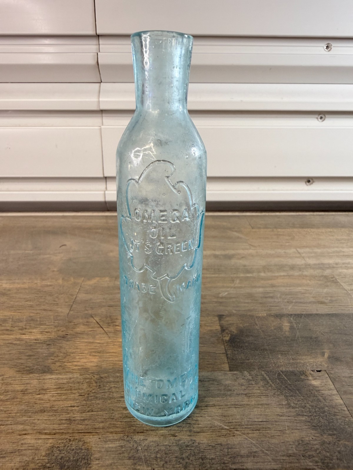 OMEGA OIL IT'S GREEN THE OMEGA CHEMICAL CO. NEW YORK Embossed Bottle ...