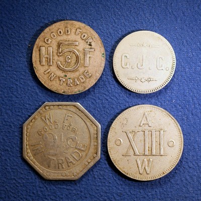 Group of 4 maverick trade tokens | eBay