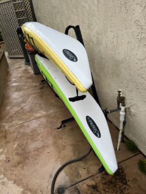 (2) Perception kayaks. one green and the other yellow. Models Sonoma 13 ...