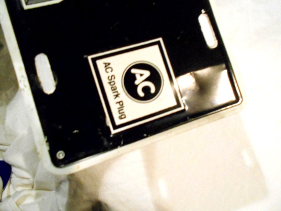 AC Spark Plug 75th Anniversary license plate-Sealed | eBay