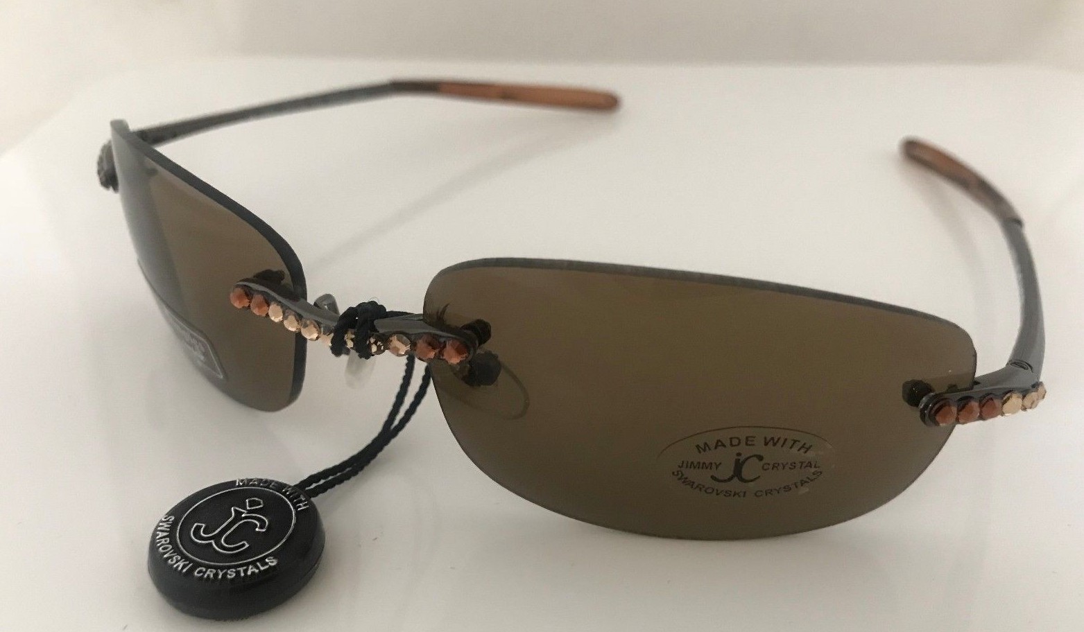 Jimmy Crystal NY Brown Topaz Rimless Spring Temples Sunglasses, Style ...