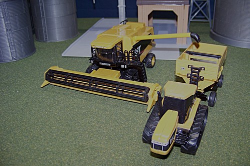 Cat Lexion 485 Combine, Cat Challenger 45 Tractor, J&M 680 Gravity ...