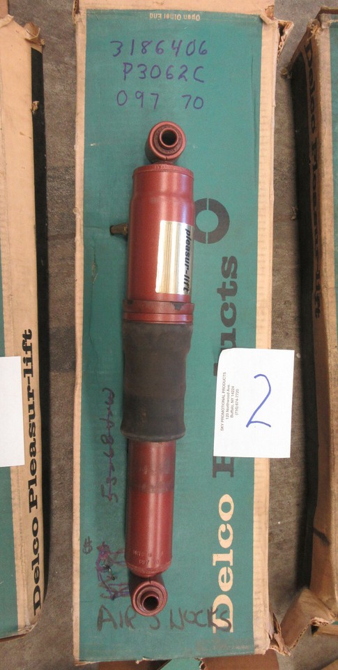 NOS Delco Pleasur-Lift Air Shock - listing is for ONE shock only oem ...